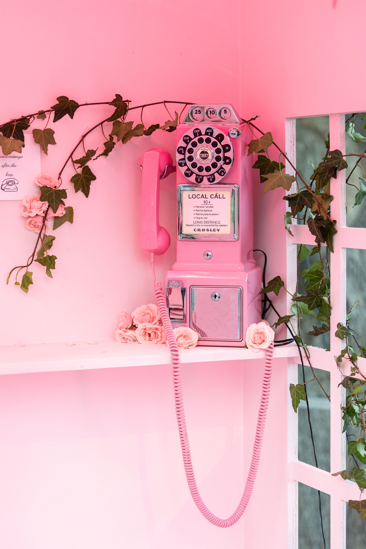 Kelly-Simpson-Jeffrey-Buzzelli-pink-pay-phone-VERT
