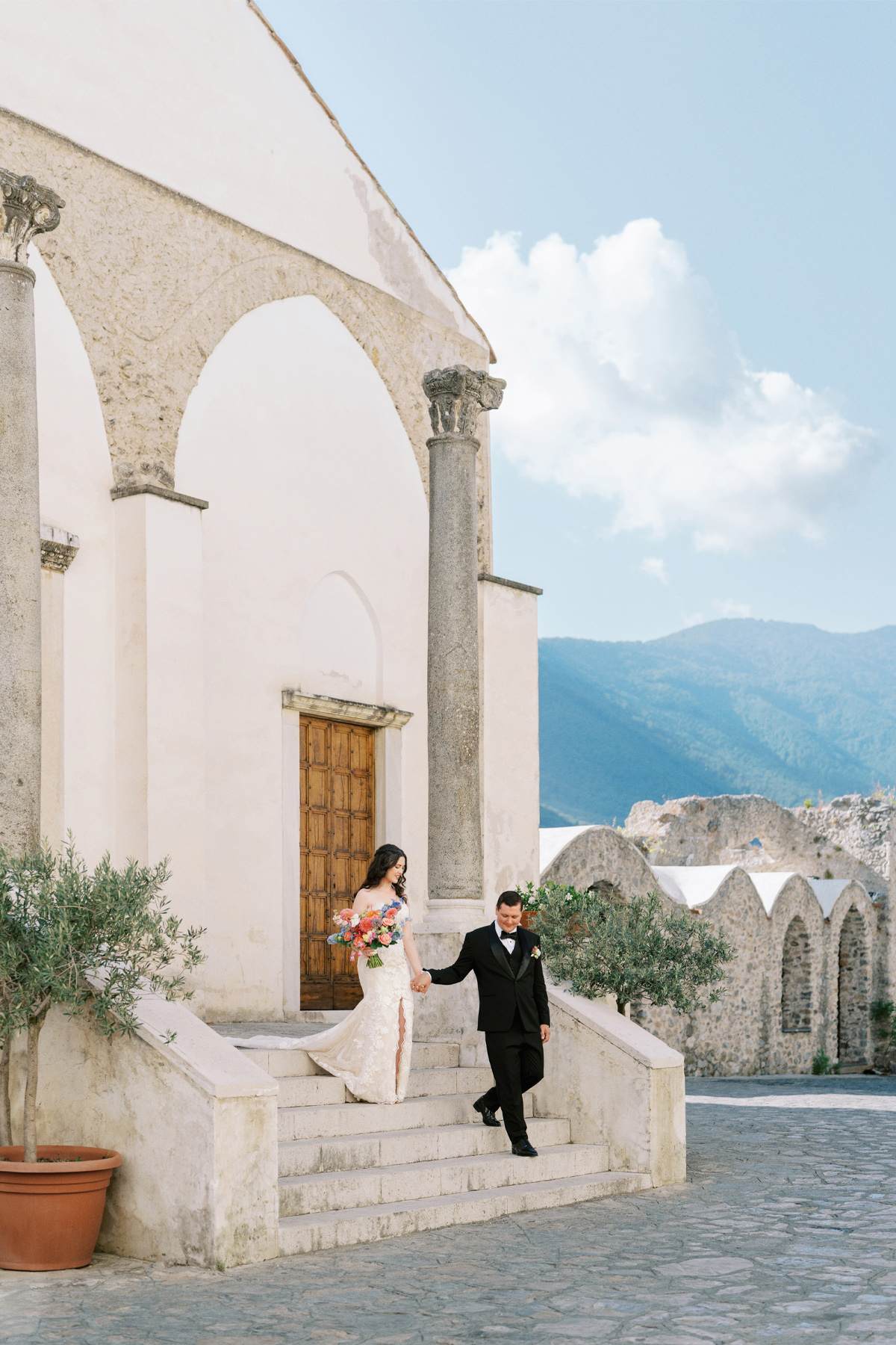 Amy-Messerschmitt-Braden-Bullard-walking-down-steps-outside-historical ...